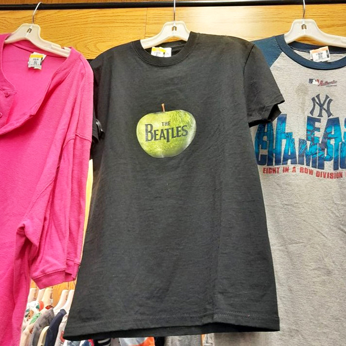 Band shirts that prove your musical taste spans decades, not just streaming algorithms. That Beatles tee? Pure vintage street cred.