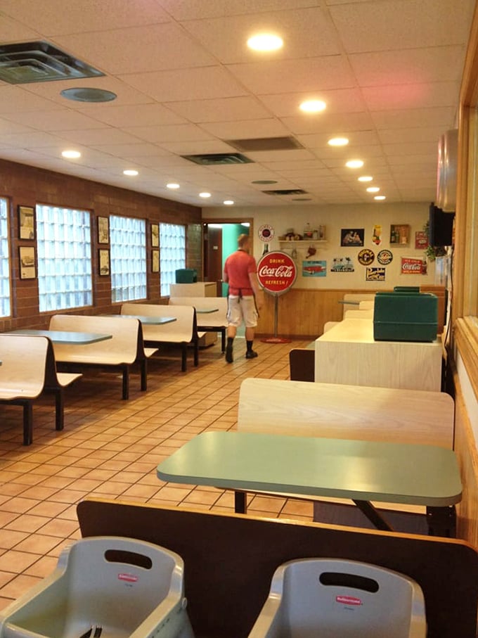 These booths have cradled the posteriors of multiple generations, all united in pursuit of the perfect burger experience.