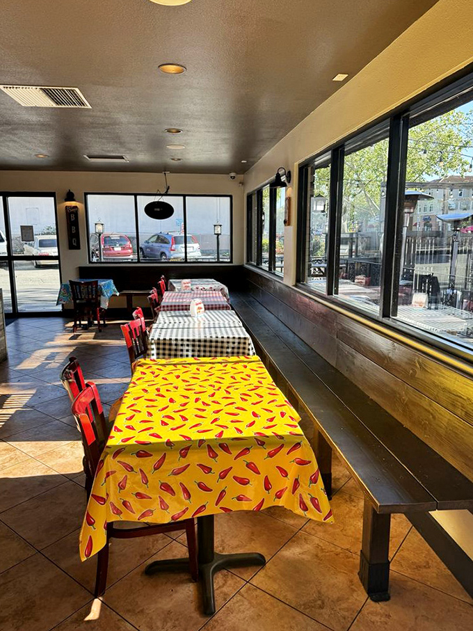 Tables dressed in playful chili pepper patterns and classic checks &ndash; the runway where barbecue makes its grand entrance before disappearing into happy stomachs.