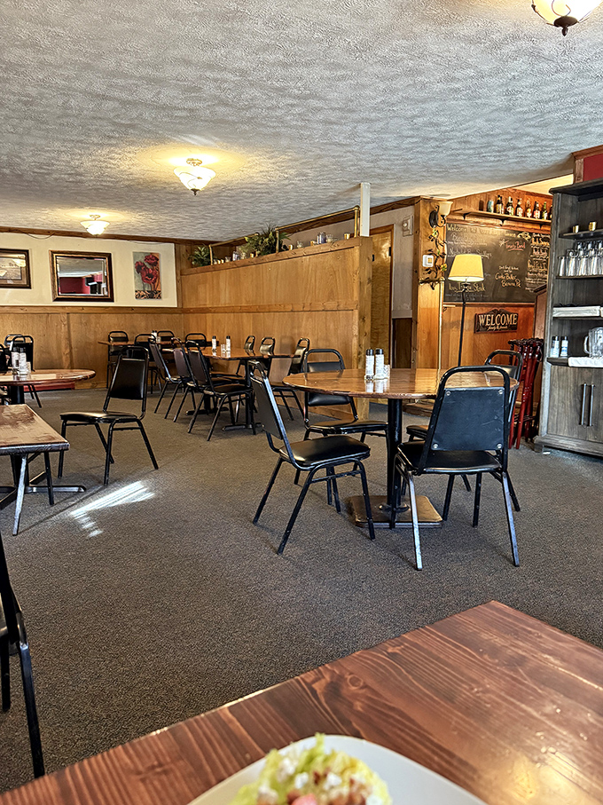 Simple tables waiting for memorable meals. No pretension here&mdash;just honest food served in a room where conversations flow as freely as the drinks.