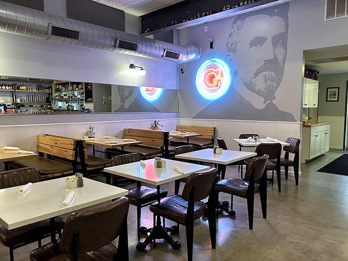 Simple tables that let the food be the star. The neon sign casts a glow that says "you've found your new happy place."