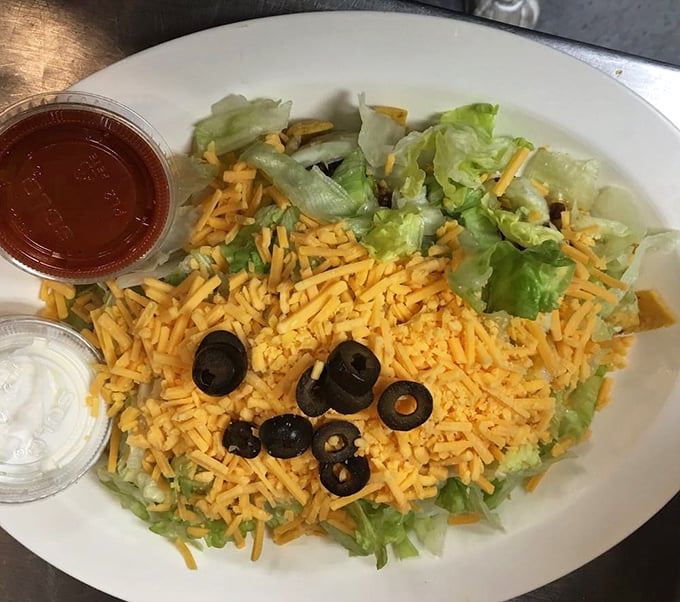 A taco salad that doesn't understand the meaning of "diet food." That cheese-to-lettuce ratio speaks to my soul on a spiritual level.