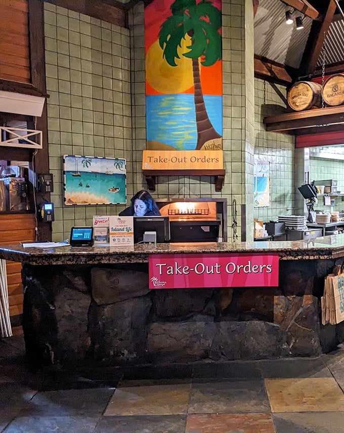 Even the take-out counter got the memo: tropical murals and island vibes make waiting for your food feel less like a chore and more like a mini-vacation.