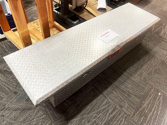 That toolbox isn't just metal—it's potential adventures in home improvement, waiting for someone brave enough to claim it.