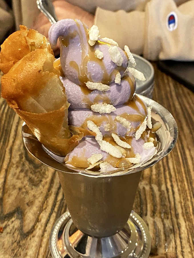 Purple yam ice cream with caramel and crispy elements&mdash;dessert that's both Instagram-worthy and too delicious to pause for photos.