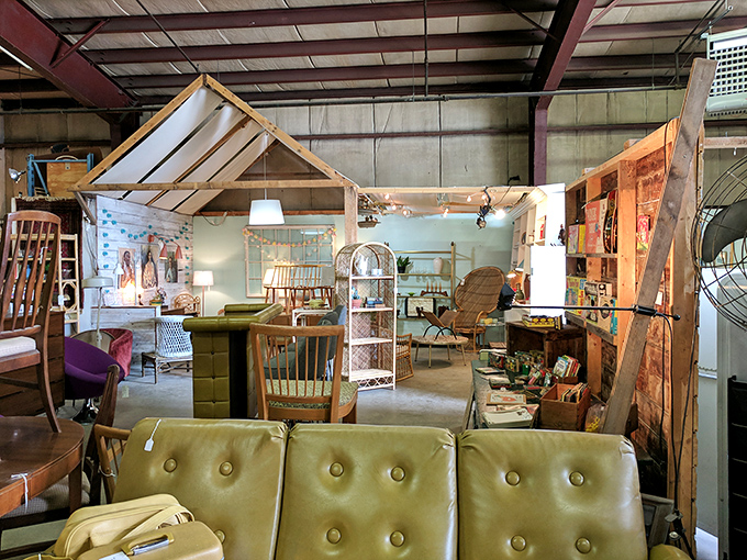 Architectural salvage creates room-within-room vignettes, proving that even walls have fascinating second acts in vintage paradise.