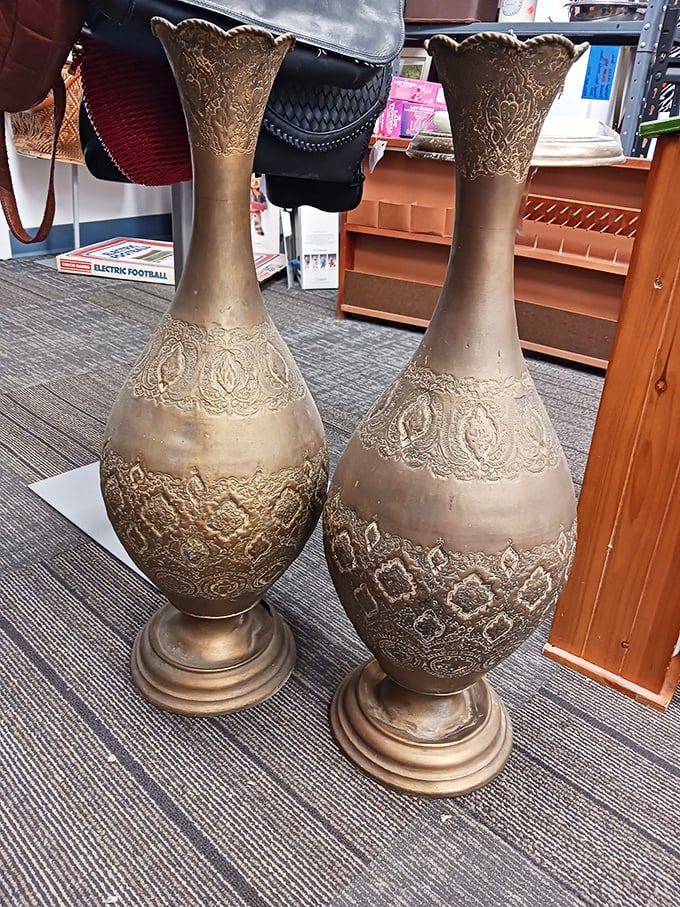 Twin bronze beauties! These ornate vases are ready to elevate your entryway from "nice home" to "where did you find those amazing pieces?"