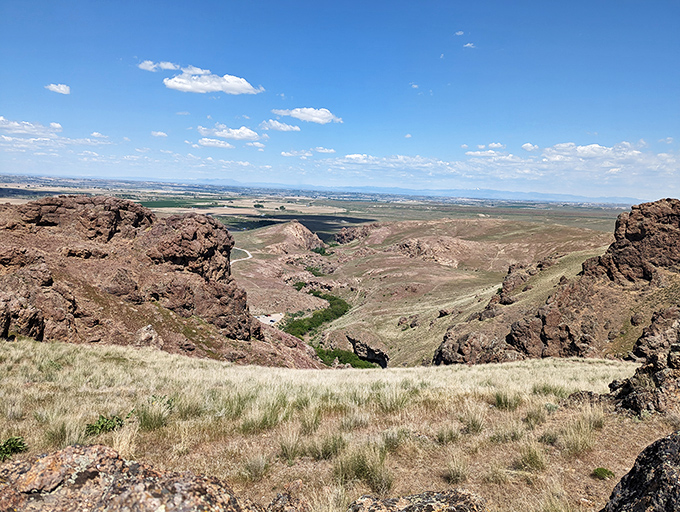 The reward for the climb &ndash; panoramic views stretch across the Snake River Plain from the canyon rim above the falls.