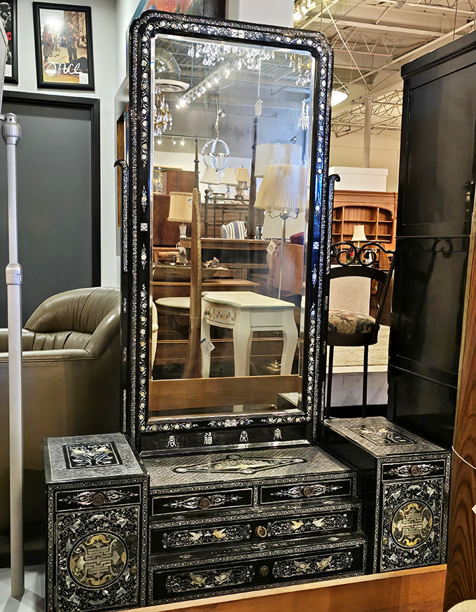 This ornate black lacquer vanity isn't furniture—it's a daily ritual waiting to happen, with stories etched into every intricate inlay.