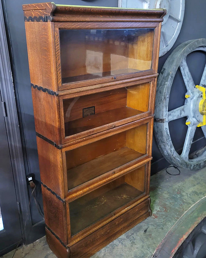 This barrister bookcase once protected legal tomes behind those glass panels, but now stands ready to display your treasured collectibles with equal dignity.