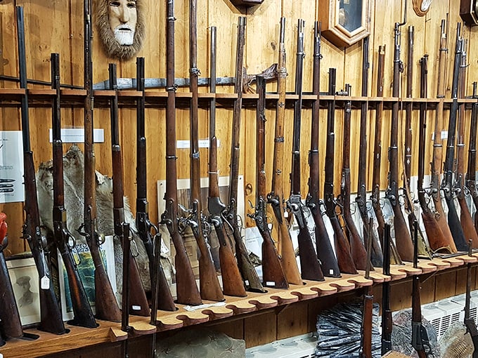 The wall that launched a thousand hunting stories. These vintage rifles have witnessed Alaska's transition from territory to statehood and beyond.