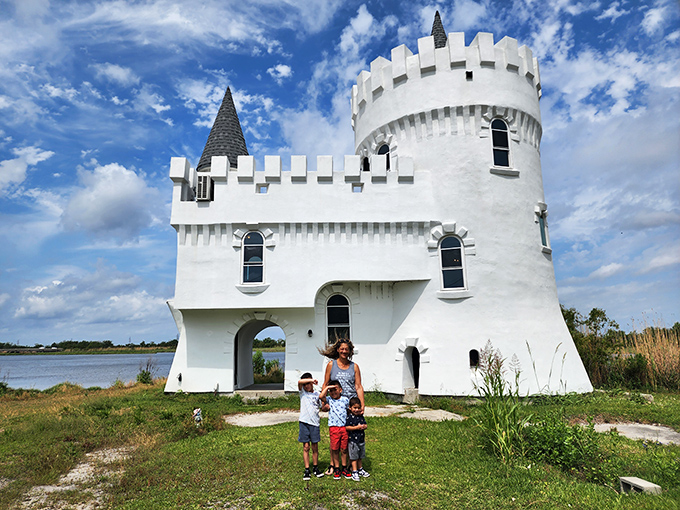 The castle provides the perfect backdrop for family photos, creating memories that combine childhood fantasy with roadside Americana.