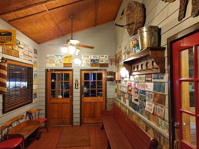 The waiting area, adorned with license plates from visitors far and wide, serves as a hall of fame for road-trippers who've made the barbecue pilgrimage.