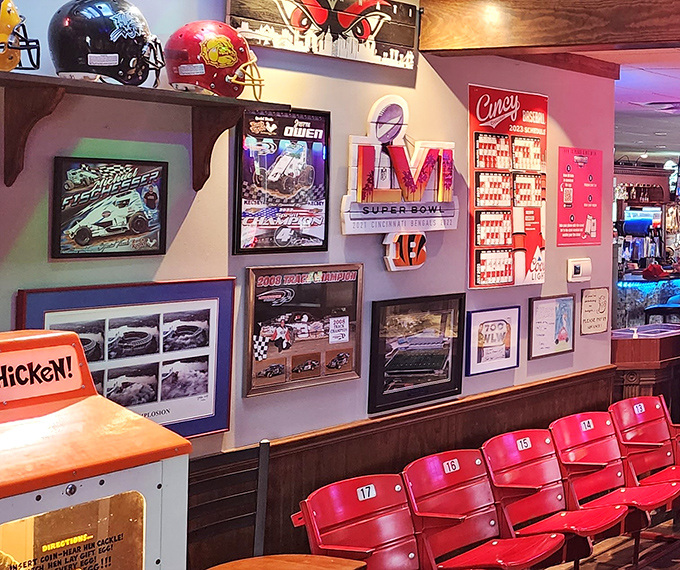 Sports memorabilia and red stadium seats create a shrine to Cincinnati's teams, where fans can worship both the Bengals and a good meal.