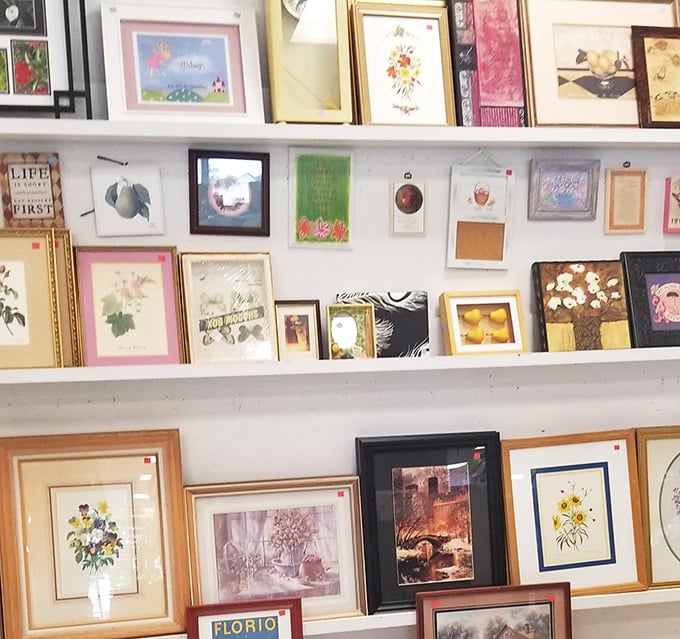 The wall art section&mdash;where someone's discarded "Live Laugh Love" print becomes another's ironic apartment decor or genuine inspiration, no judgment either way.