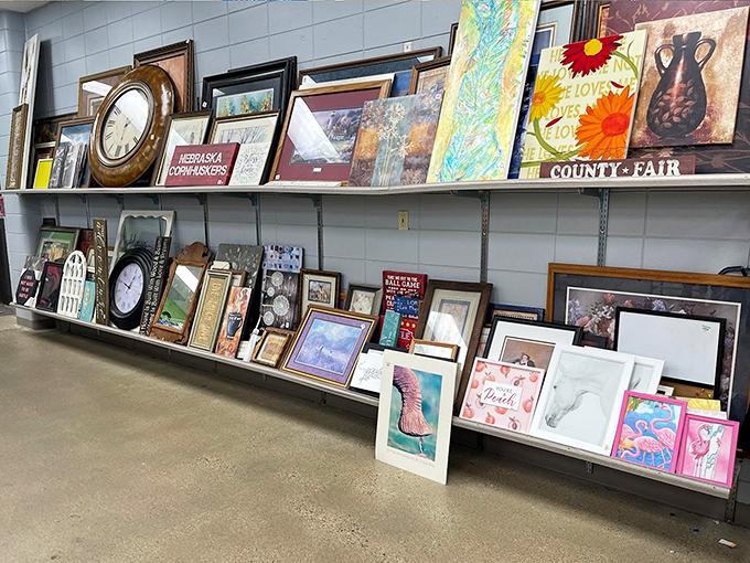 Wall art galore&mdash;because blank walls are just canvases waiting for someone else's discarded inspiration. That sunset painting? Pure South Dakota gold.