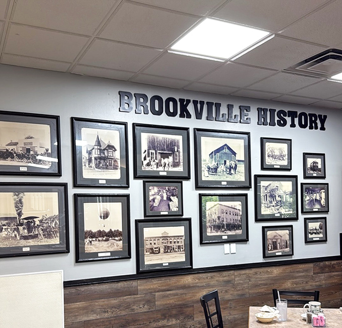 The "Brookville History" wall connects your meal to a sense of place. Dining surrounded by heritage makes the food taste even better. 