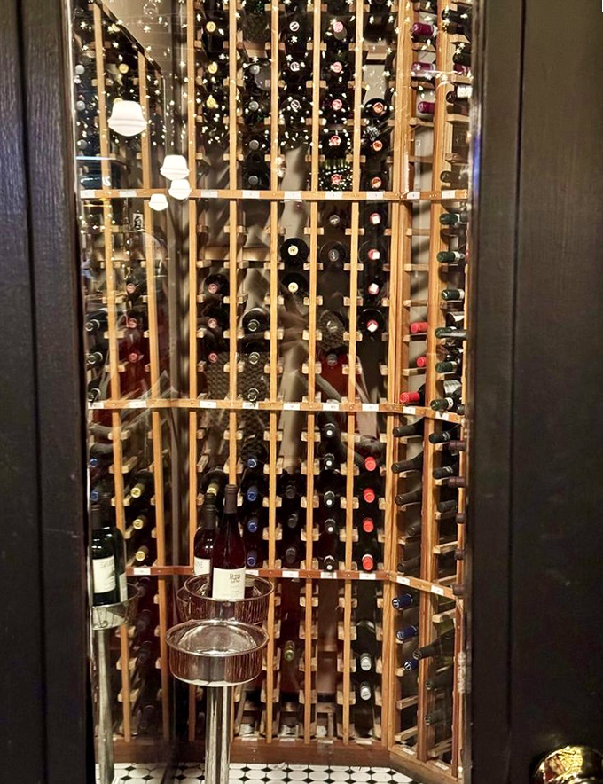 Behind that wooden rack lies liquid treasure&mdash;a wine collection curated to elevate your pizza experience from great to transcendent.