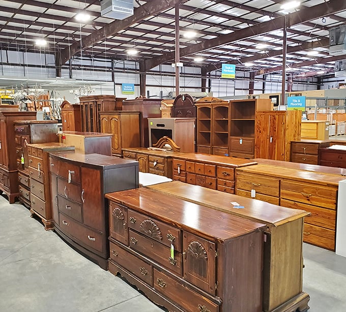Wooden furniture paradise where every piece has character and history. That carved drawer front probably has stories to tell.