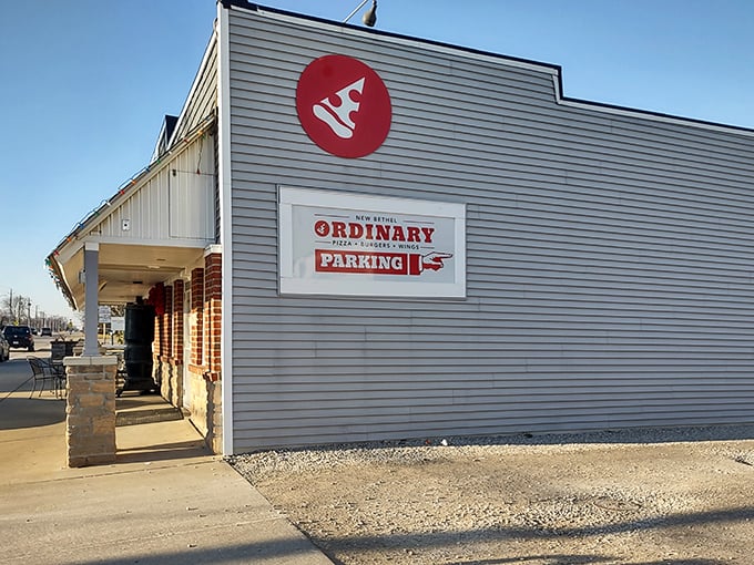 Never underestimate the power of a simple white building hiding extraordinary pizza secrets.