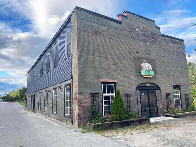 98 Mill's weathered brick exterior whispers tales of industrial heritage, now reimagined for a new chapter in St. Johnsbury's story.