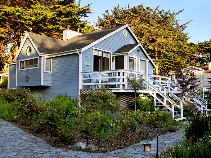 Blue cottage perfection at Agate Cove Inn, where garden paths and ocean proximity create the bed and breakfast experience of your daydreams.