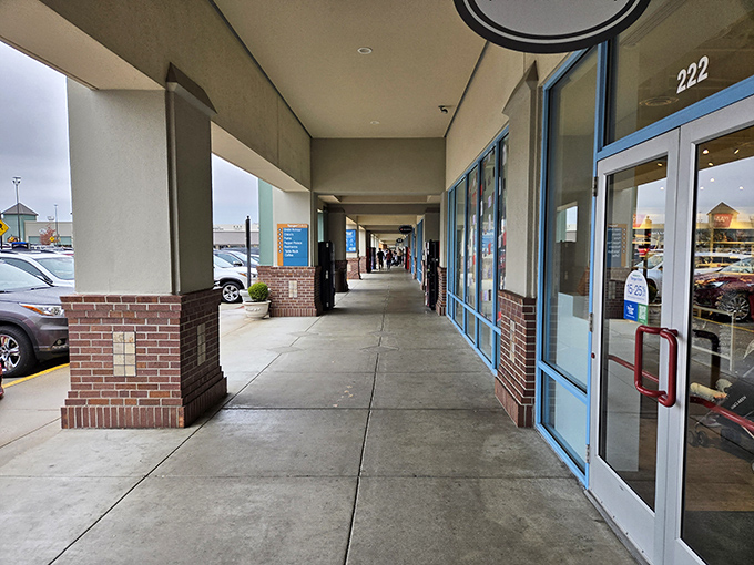 The covered walkways provide merciful shelter from Missouri's unpredictable weather, allowing shopping marathons to continue regardless of sun, rain, or snow.