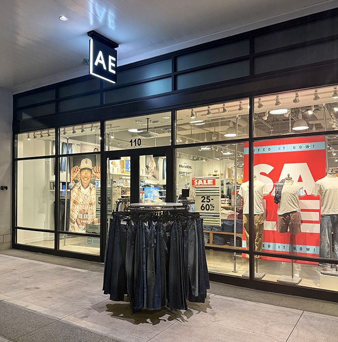 American Eagle's storefront promises the comfort of familiar fashion with the thrill of outlet prices. The rack outside is just a preview of the deals within.