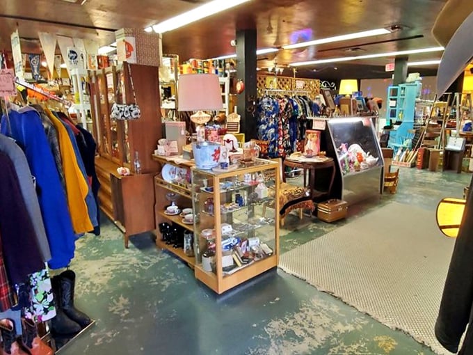 The shop floor reveals treasures at every turn. That turquoise chair isn't just seating&mdash;it's the statement piece your living room didn't know it needed.