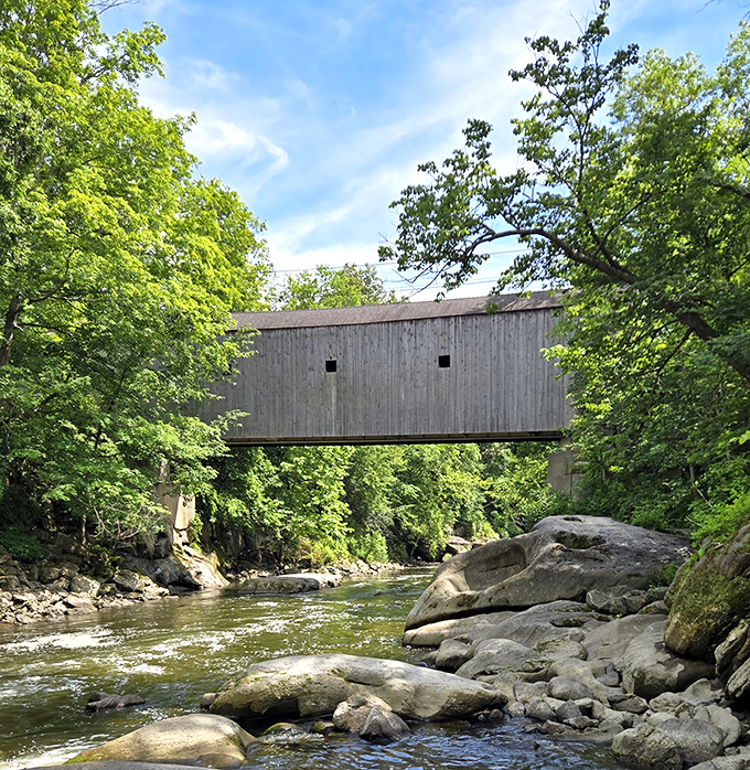 From below, Bulls Bridge reveals its true grandeur, spanning the rocky riverbed with a simple elegance that modern architects still strive to achieve.