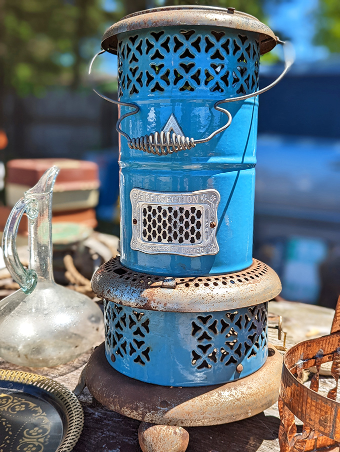 Perfection in blue! This vintage kerosene heater has retired from warming homes to warming hearts as a decorative piece with stories to tell.