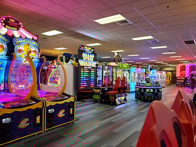 Bright lights and arcade sounds offer a perfect distraction for shopping-weary companions. The universal language of "just one more game."