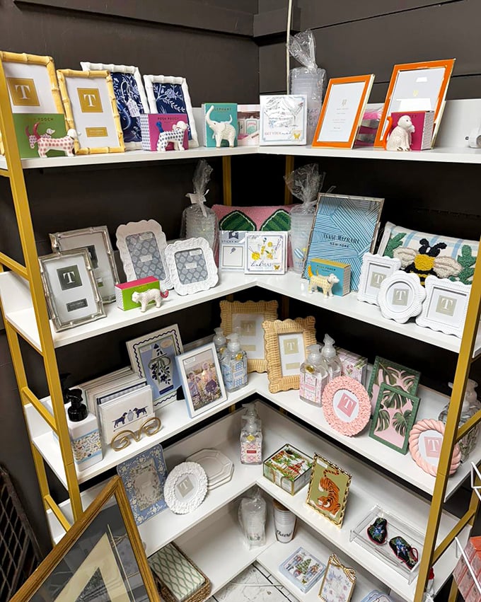 A corner of frames and figurines that proves one generation's knickknacks become another's treasured vintage finds.