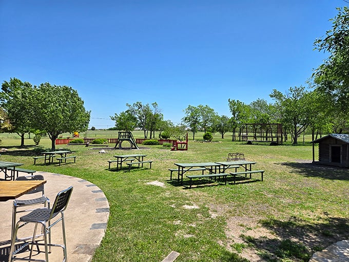A backyard that's part playground, part dining area&mdash;because in Texas, meals are meant to be followed by fresh air and room to roam.