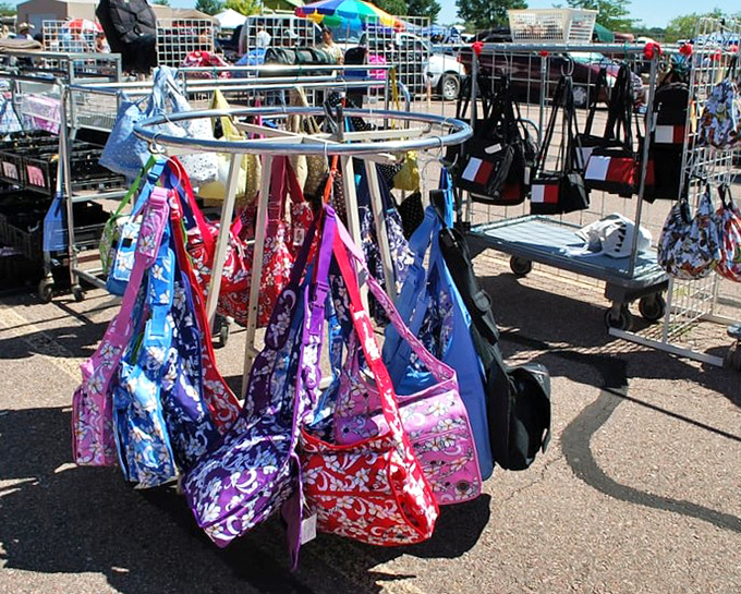 Bag bonanza! A carousel of colorful carryalls spinning with possibilities for those who believe you can never have too many purses.