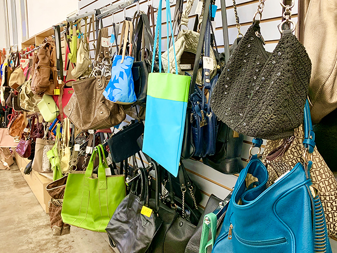 Handbag heaven&mdash;a colorful array of purses, totes, and clutches hanging like exotic fruit, ripe for the picking and ready for new adventures.