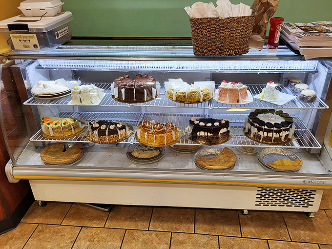 The dessert case of temptation &ndash; where willpower goes to die and "I'll just have coffee" turns into "and a slice of that chocolate cake."