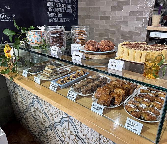 A pastry case that renders willpower obsolete &ndash; each labeled treat more tempting than the last, displayed like edible jewelry.