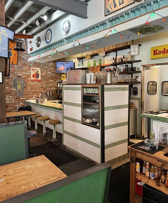 Brick walls lined with vintage collectibles and blue mason jars create an atmosphere that's equal parts nostalgia and neighborhood hangout.