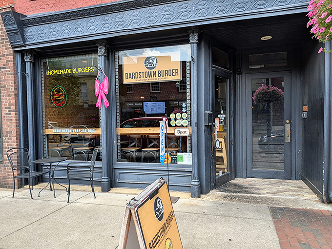 Bardstown Burger serves up handcrafted patties in an unpretentious setting. That neon sign promises satisfaction that chain restaurants can only dream of delivering.