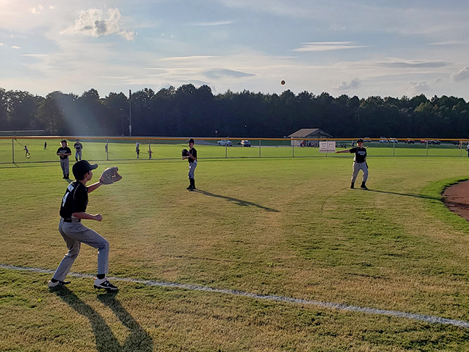 As evening falls on Senoia's baseball field, young players create memories that will outlast even the most impressive home runs.
