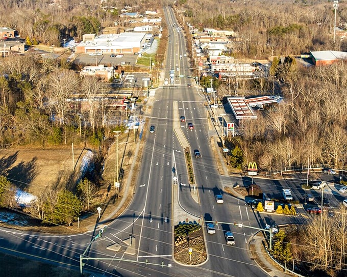 This aerial perspective reveals how Morganton's commercial district seamlessly blends with residential areas, creating a livable, walkable community.