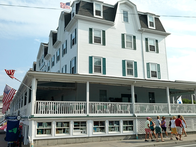 The Block Island Beach House's wraparound porch practically whispers "afternoon cocktails with an ocean soundtrack" to passing travelers.