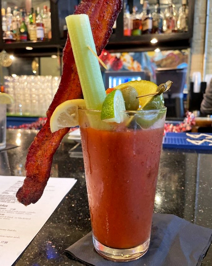 This Bloody Mary isn't just a drink&mdash;it's a meal with a straw. That bacon strip looks like it's trying to escape, but you'll catch it.