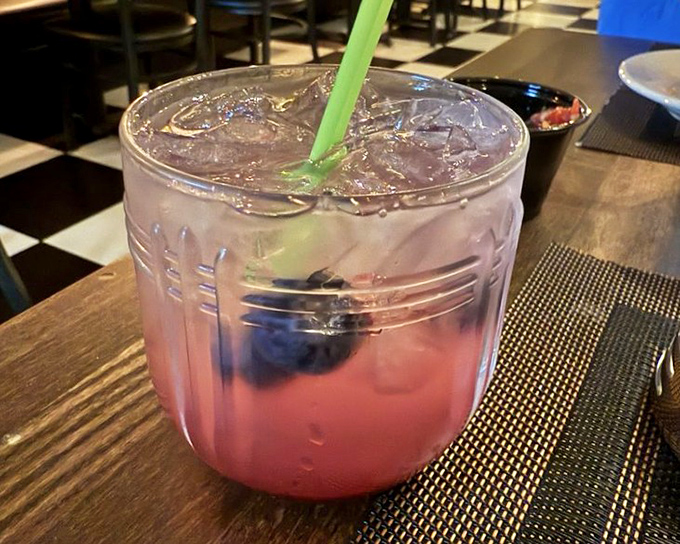 This isn't just a cocktail; it's a refreshing escape with berries that sacrificed themselves for your moment of bliss. Summer in a glass.