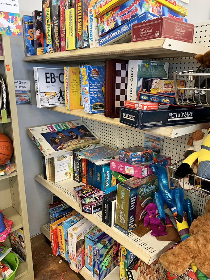 Board games stacked like childhood memories waiting to happen, minus the soul-crushing retail price tags of yore.
