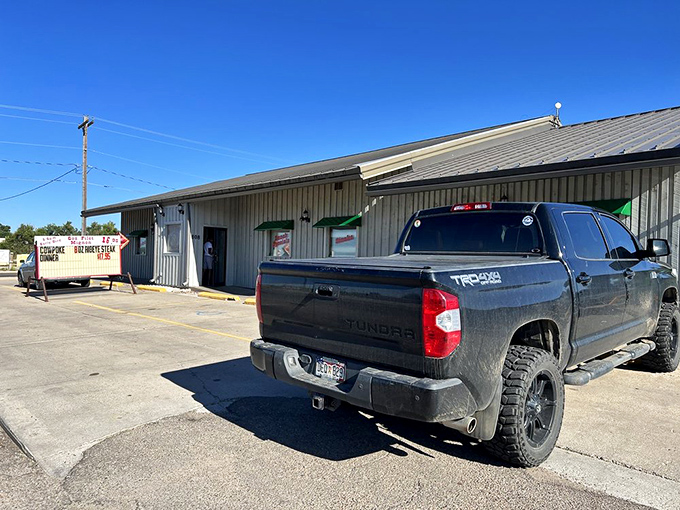 Boss Hogg's unassuming exterior hides culinary treasures within. That pickup truck isn't just parked&mdash;it's making a wholehearted endorsement of what's cooking inside.