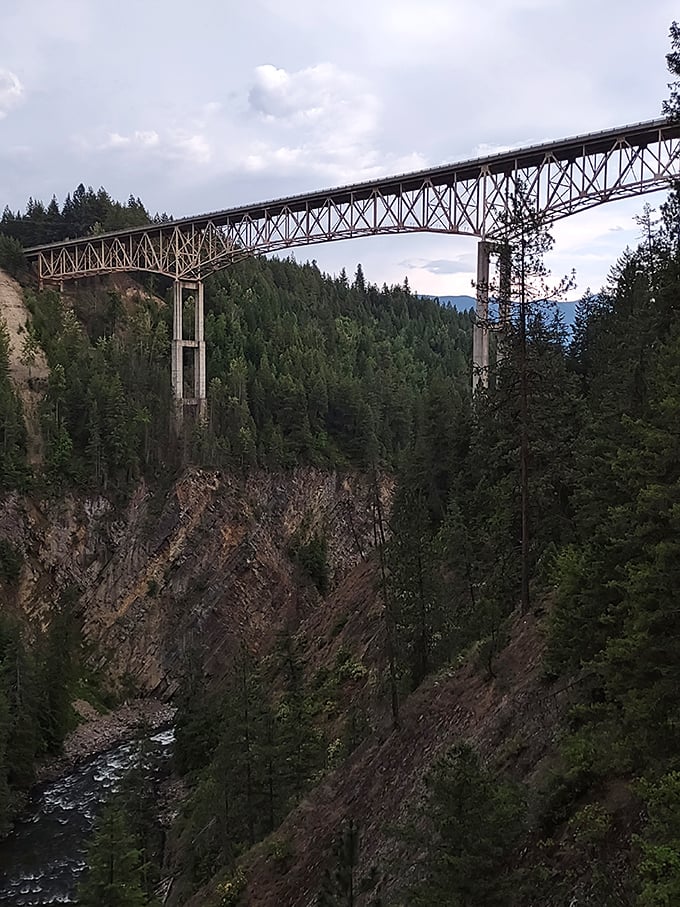 Twilight softens the canyon's edges as the bridge stands silhouetted against the fading light&mdash;Idaho's magic hour at its finest.
