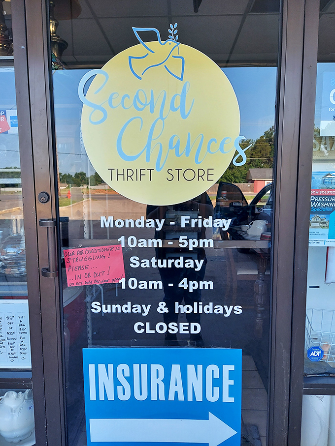 The cheerful yellow and blue logo with store hours posted clearly&mdash;the gateway to adventure that's open six days a week for your treasure-hunting pleasure.