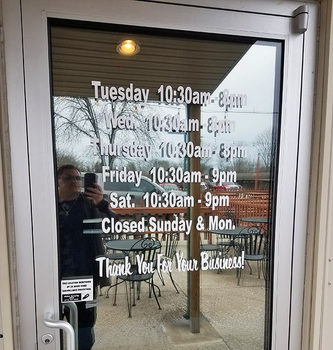 Business hours posted clearly&mdash;because knowing when you can get your next BBQ fix is essential information for survival.